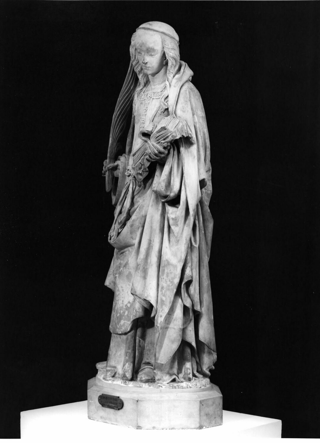 Sainte martyre tenant une palme et un livre ouvert - Louvre Collections