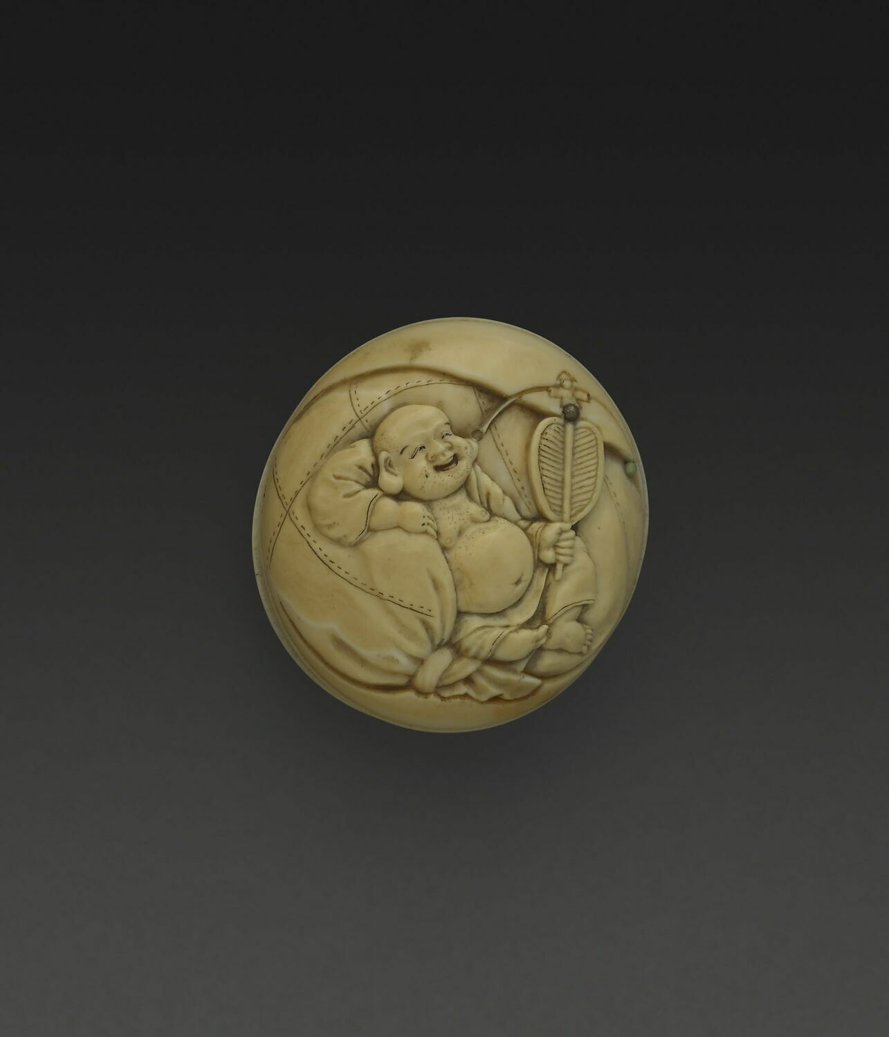 Manju netsuke avec le dieu Hotei - Louvre site des collections